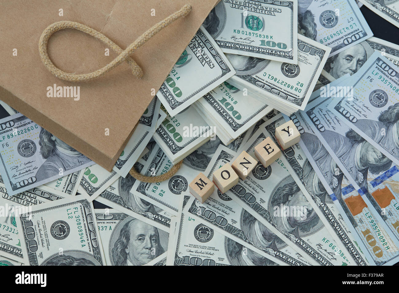 Wooden blocks - the inscription money. a lot of money out of a paper ...