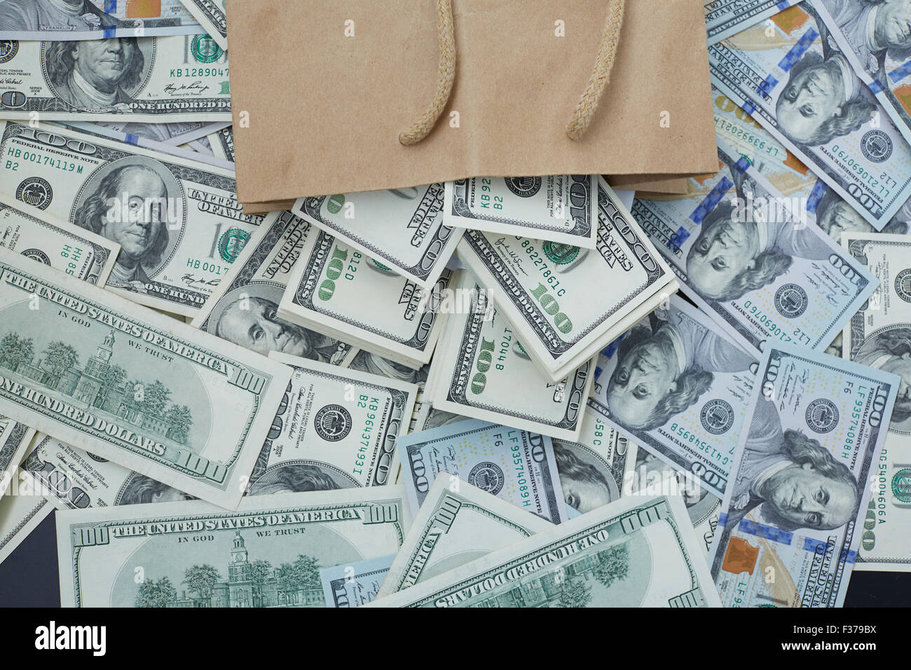 much money out of a paper bag Stock Photo - Alamy