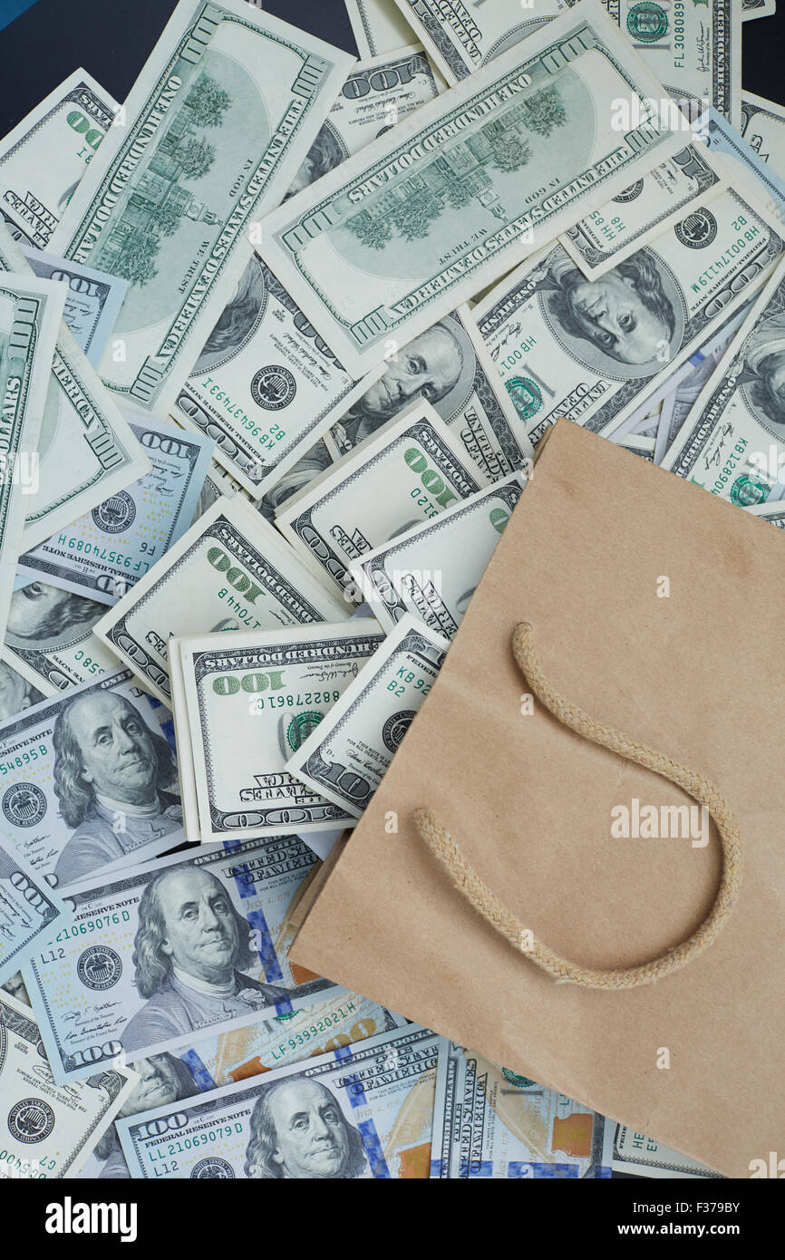 much money out of a paper bag Stock Photo - Alamy