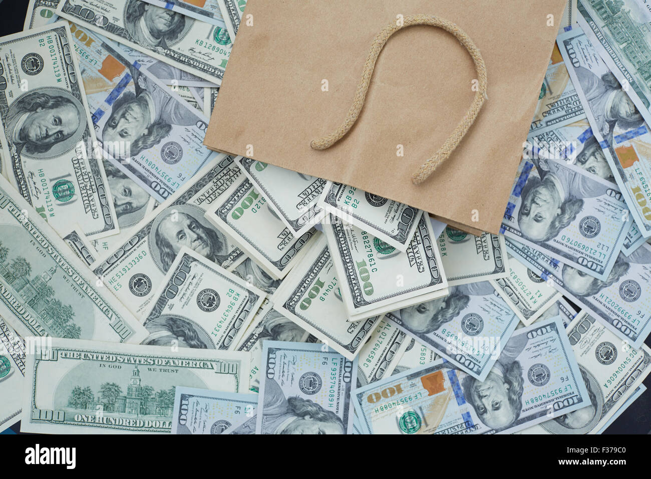 much money out of a paper bag Stock Photo - Alamy