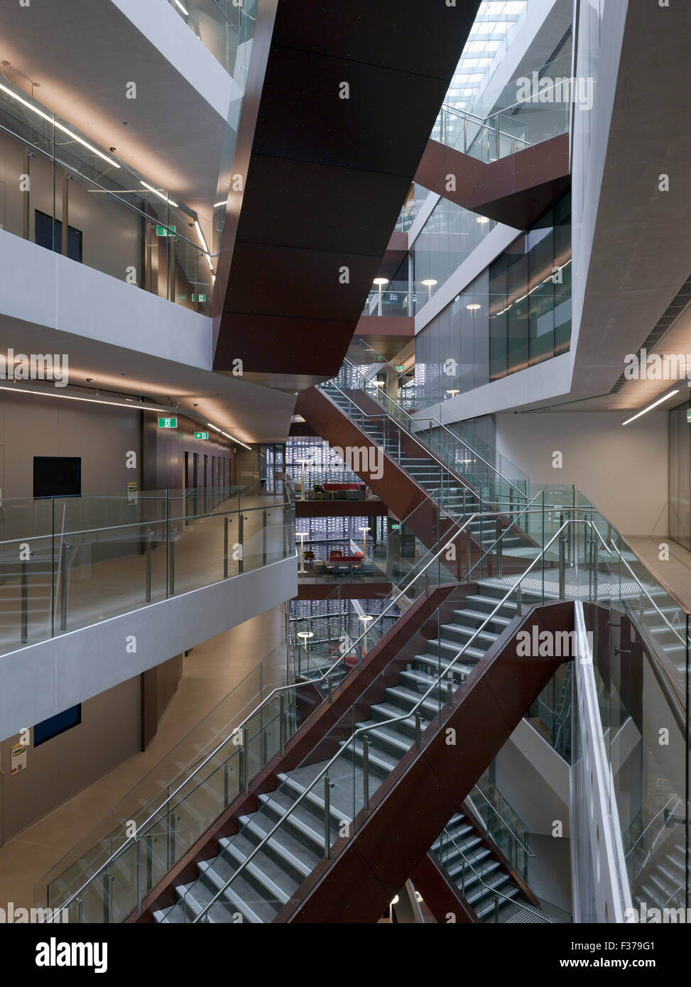 View of central atrium featuring angled staircases. Faculty of ...