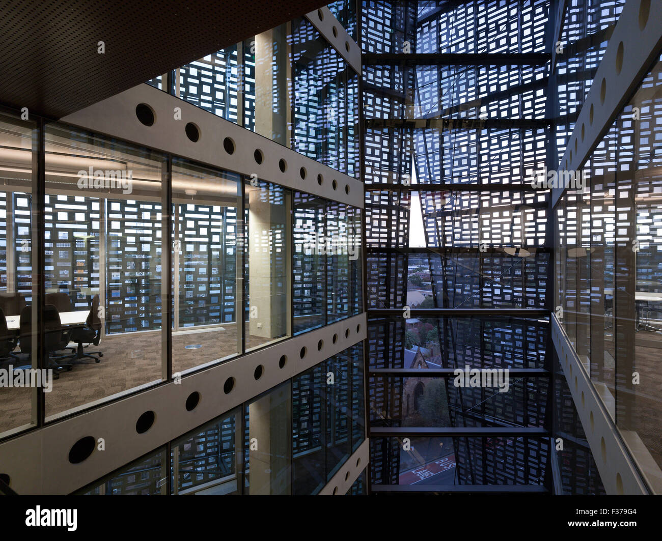 Atrium with office, exterior screen and filtered view beyond. Faculty ...
