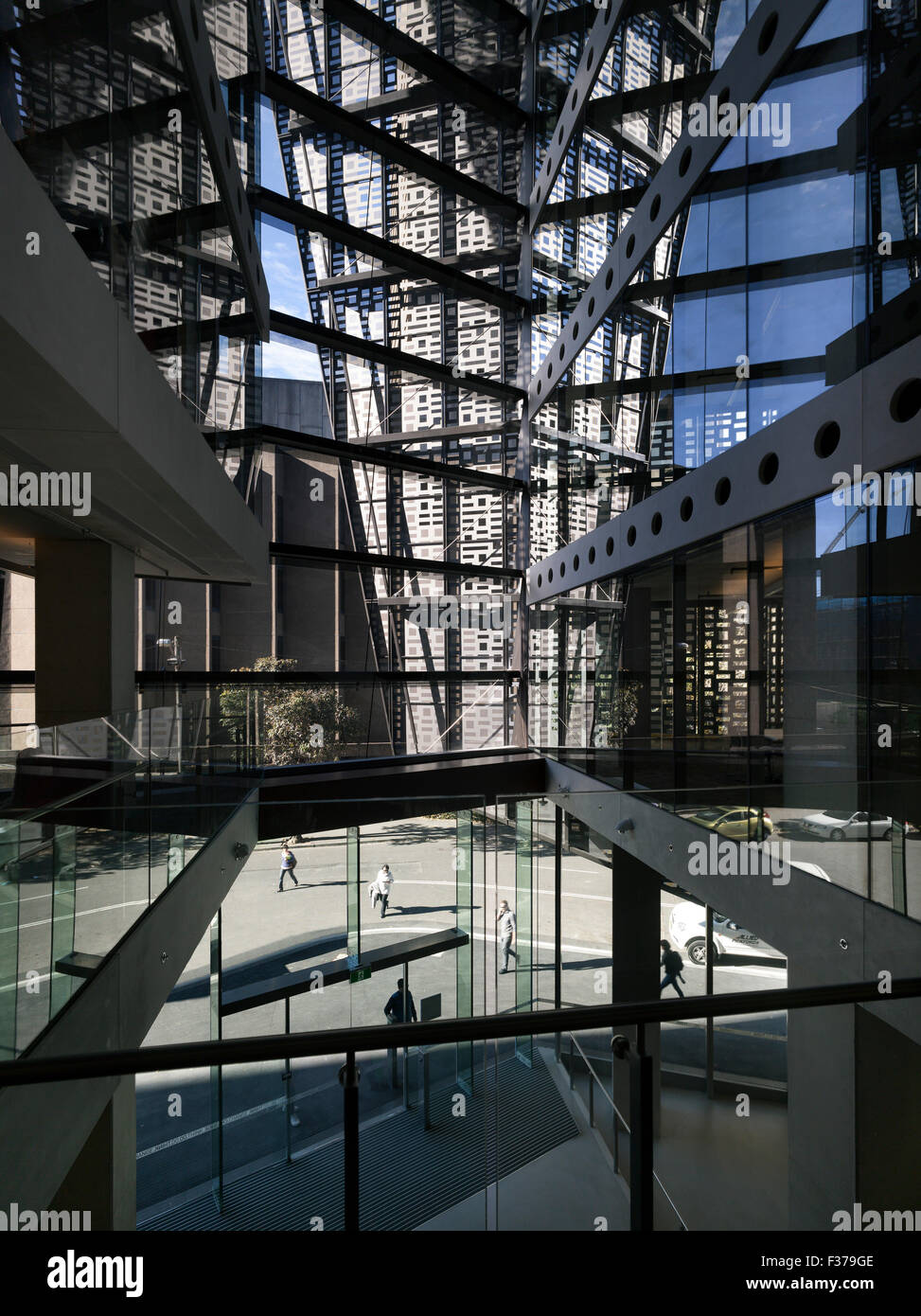 View from interior across atrium and through screens to street beyond ...