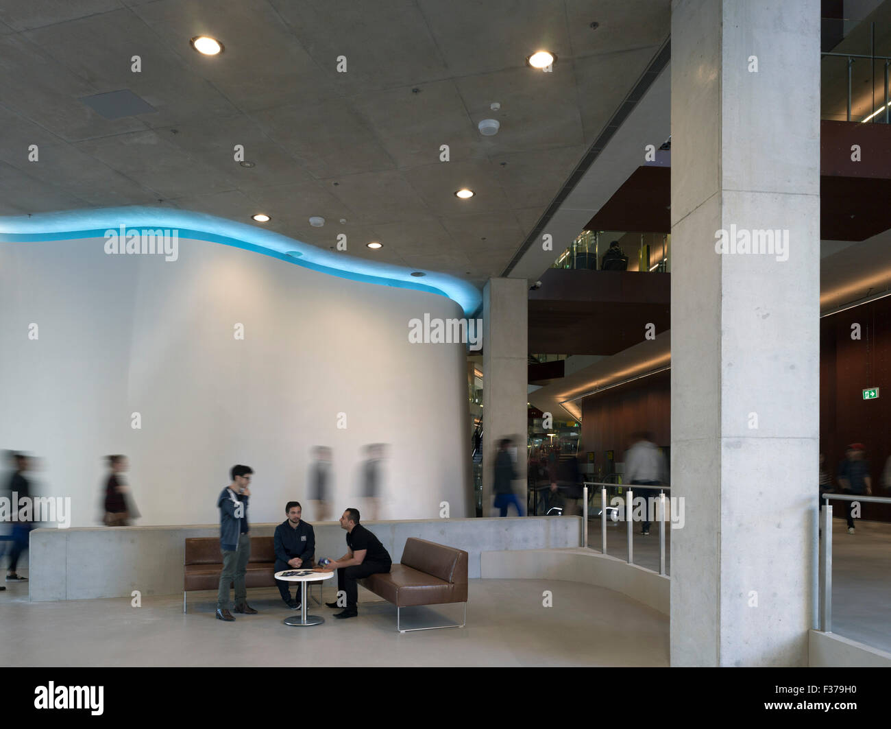 Interior entry with students. Faculty of Engineering + Information ...