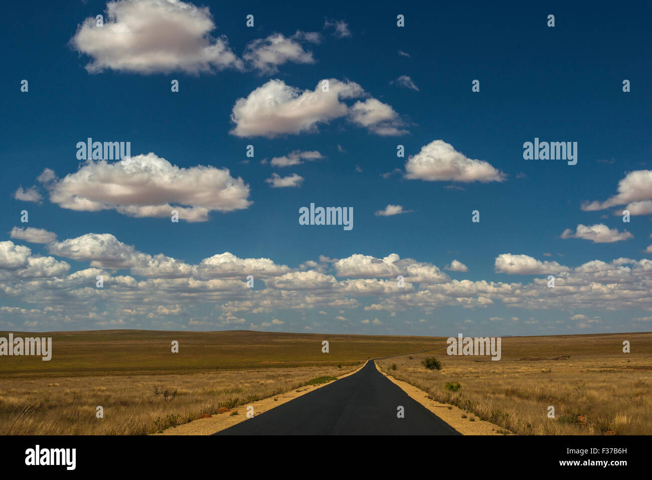 Road with cloudy sky, Plateau Isalo at Ranohira, Madagascar Stock Photo ...