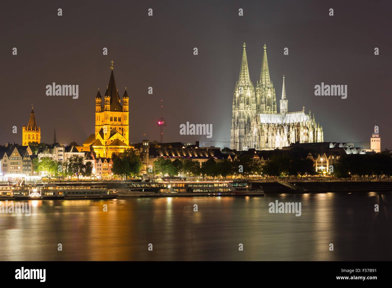City panorama of Cologne at night, cathedral, Philharmonic, Great St ...