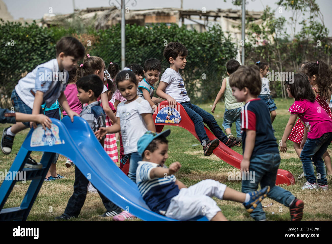 Cairo, Egypt. 30th Sep, 2015. Syrian kids have fun on the playground ...