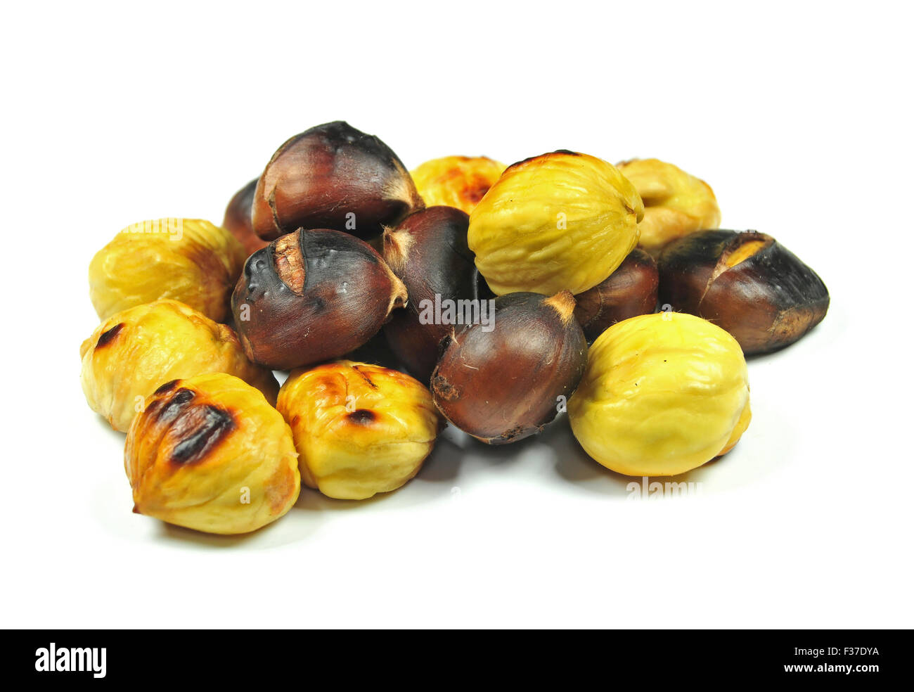 Close up photo of roasted chestnuts on white background Stock Photo - Alamy