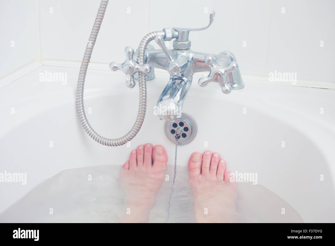 Young woman feet bath hi-res stock photography and images - Alamy
