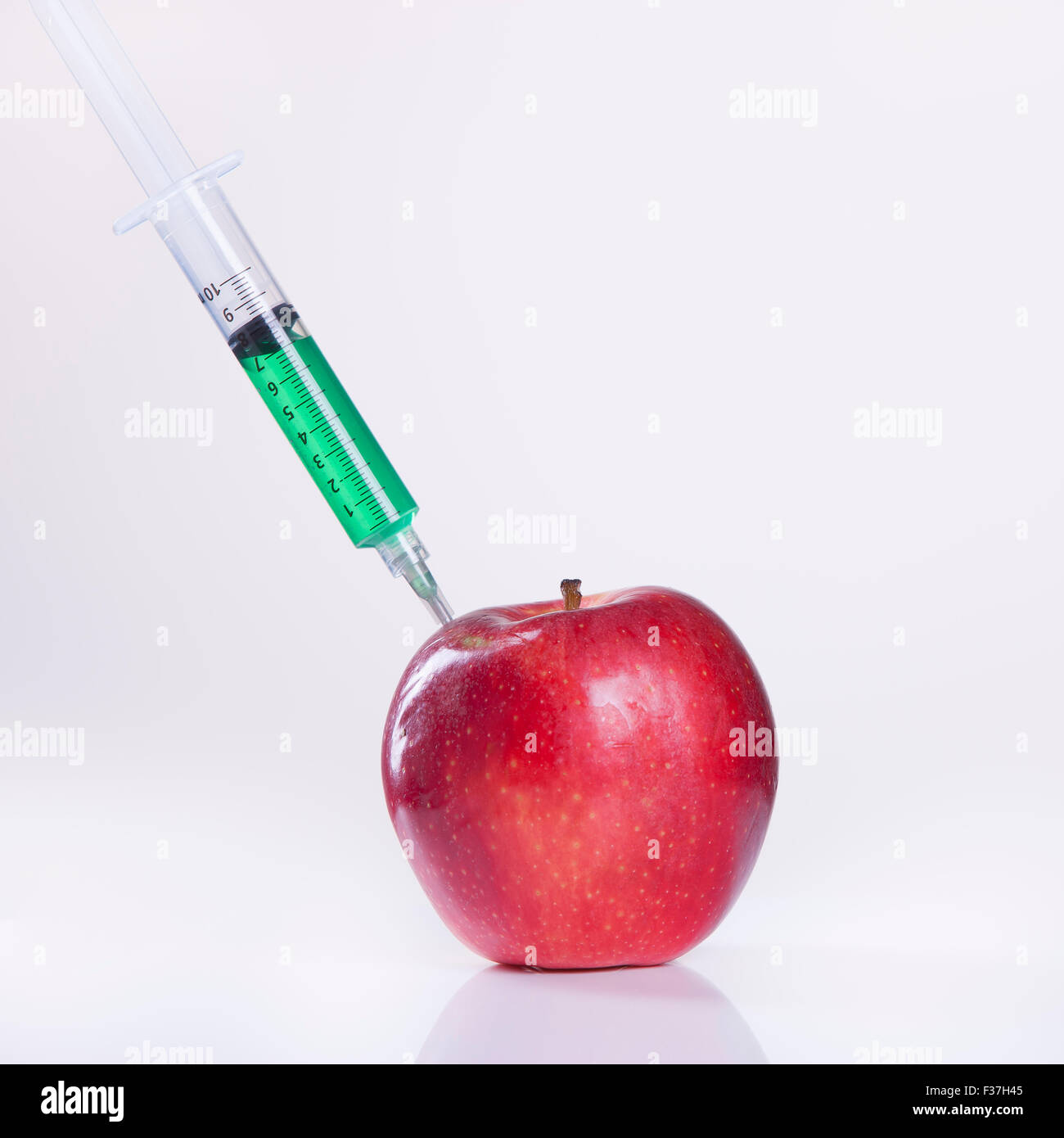 Gmo injection food apple hi-res stock photography and images - Alamy