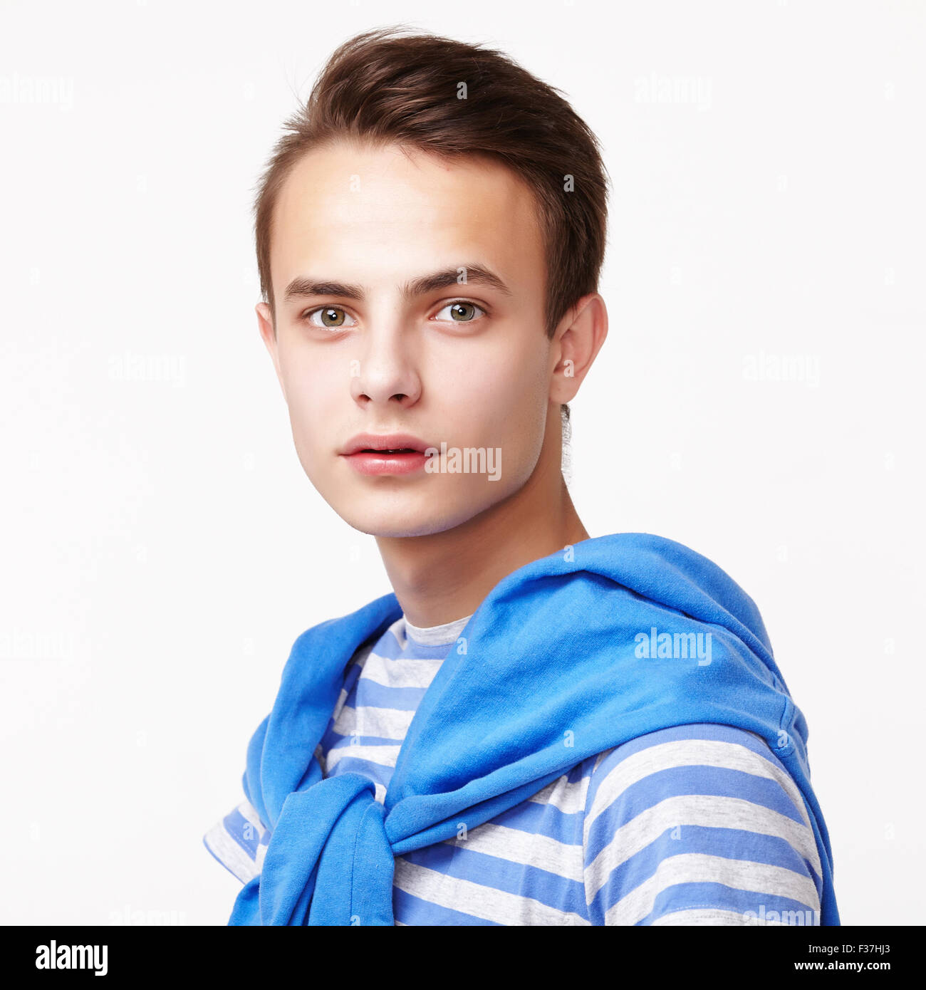 Portrait of a guy in a blue striped clothes Stock Photo - Alamy