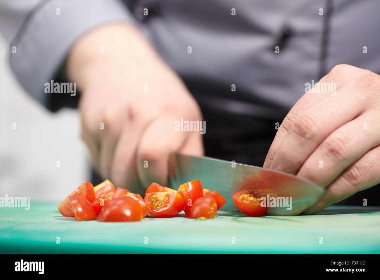 Cook chopped tomatoes Stock Photo - Alamy
