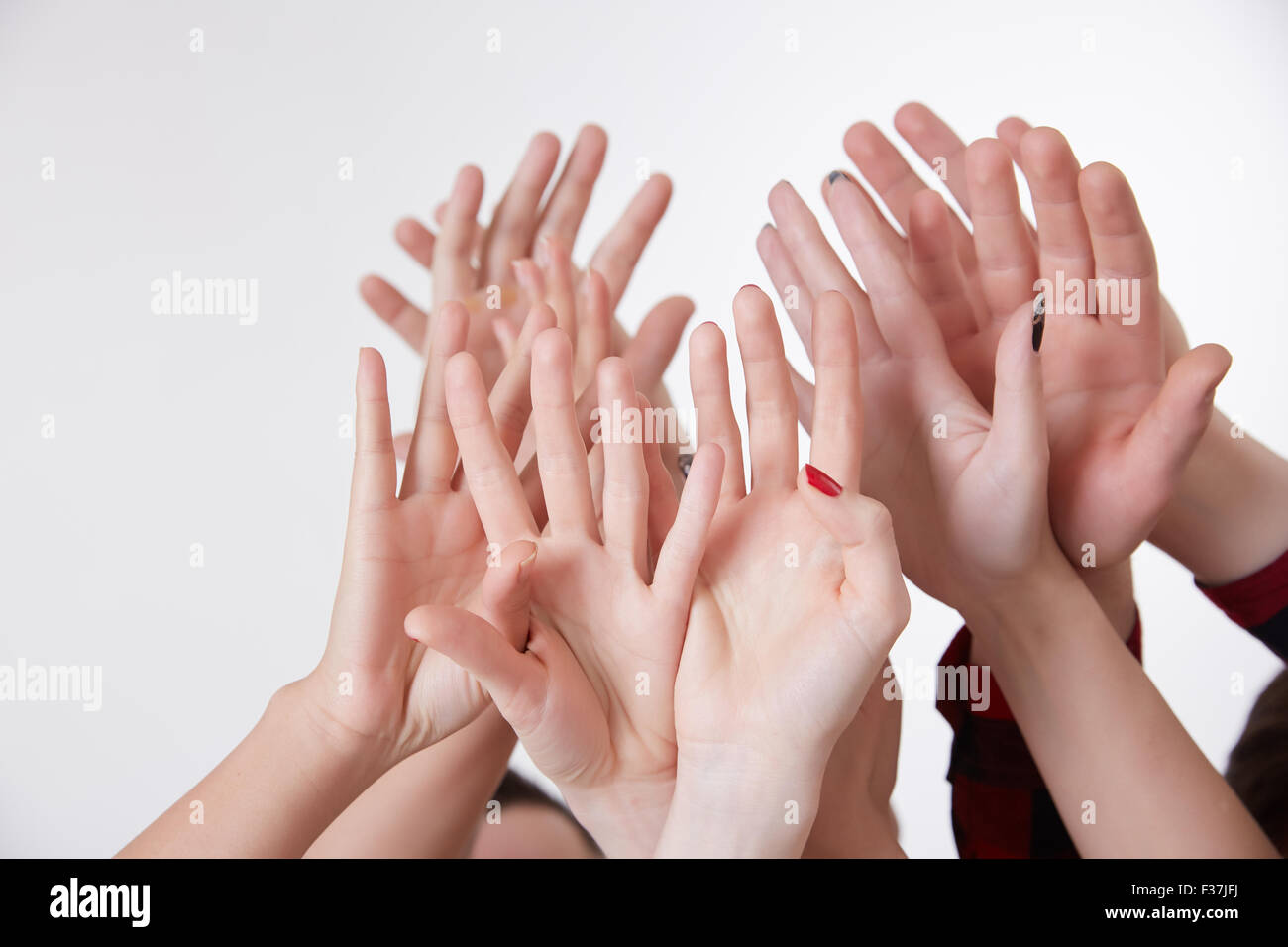 many hands reaching up Stock Photo - Alamy