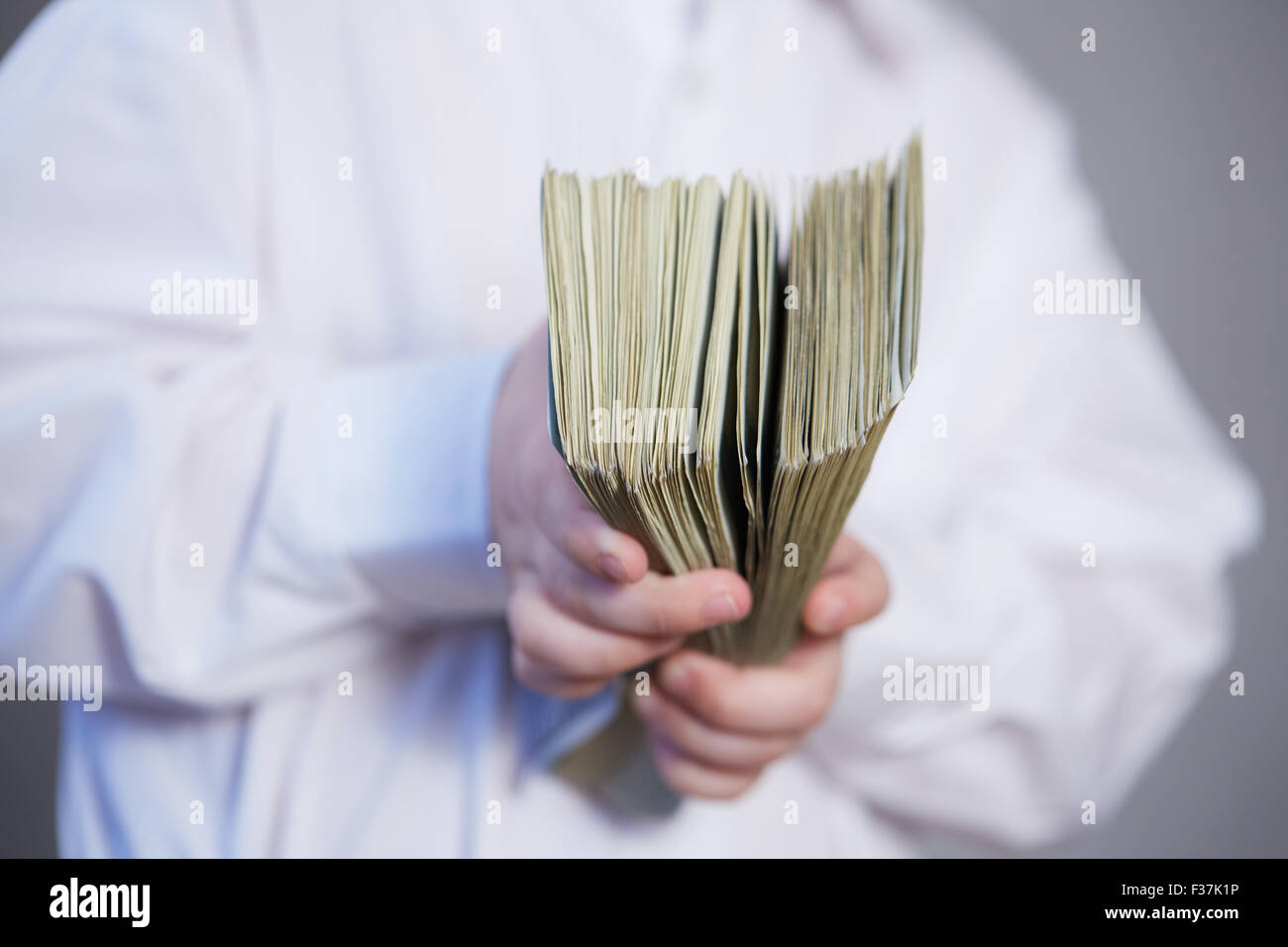 money in children's hands Stock Photo - Alamy
