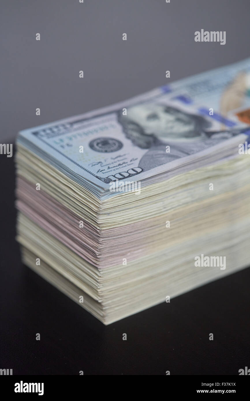 stacks of money Stock Photo - Alamy