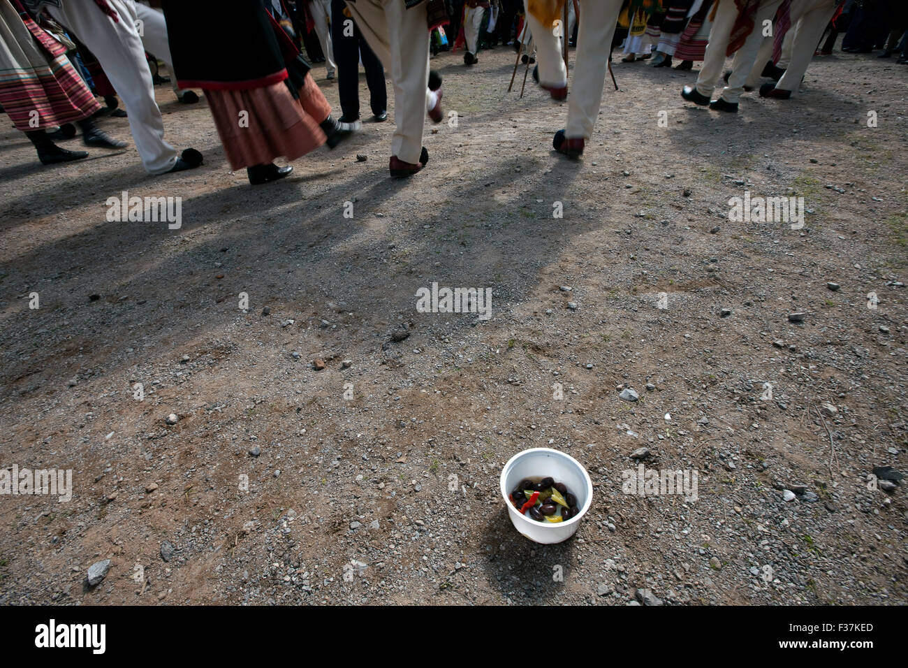Vlachs dance in circular movement next to a plastic bowl with Lent ...