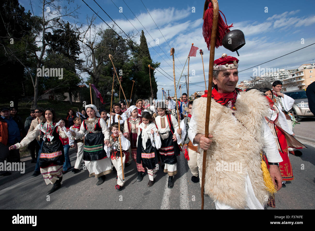 A Sham is leading a group of young Greek vlach wedding dancers team who ...
