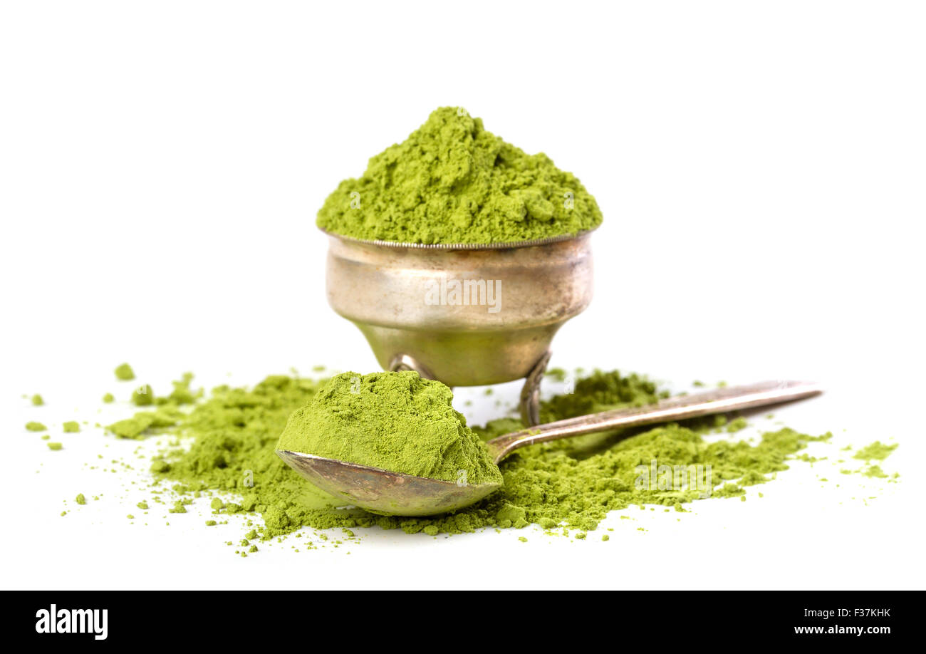 Powder green tea isolated on white background Stock Photo - Alamy