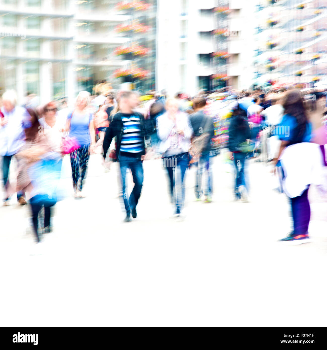 Hurrying crowd of people on the street. Abstract motion picture Stock ...