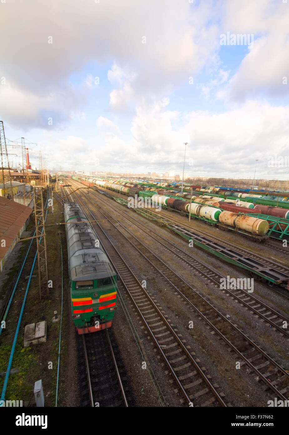 Freight train with color cargo containers in depot Stock Photo - Alamy