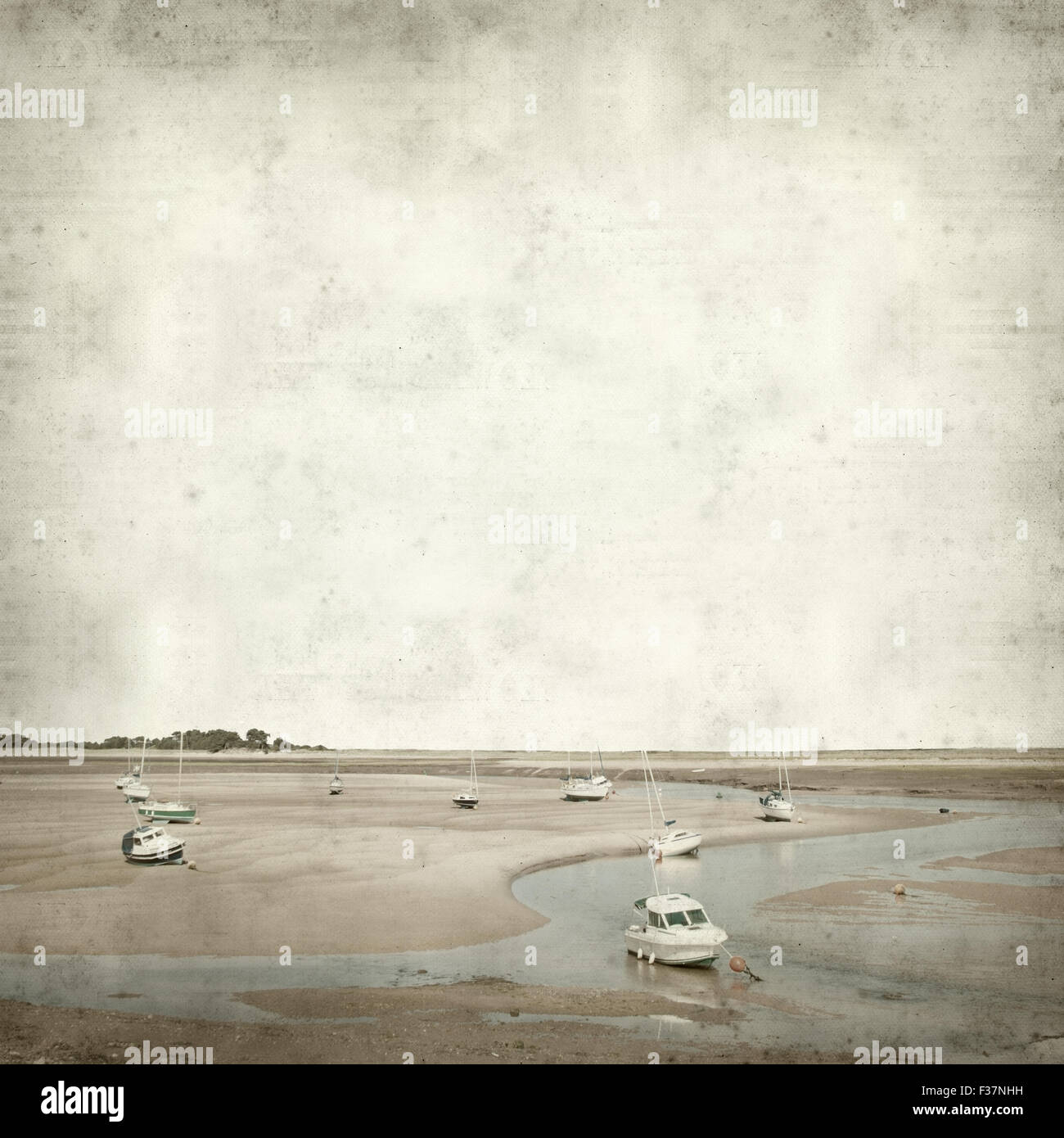 textured old paper background withWells-next-the-Sea in low tide Stock ...