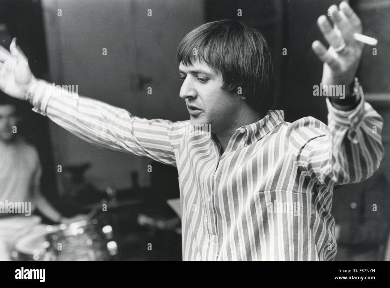 SONNY BONO US singer at a recording session in August 1966. Photo Tony ...