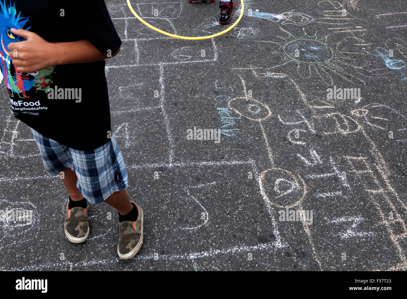 Child chalk drawing on pavement - USA Stock Photo - Alamy