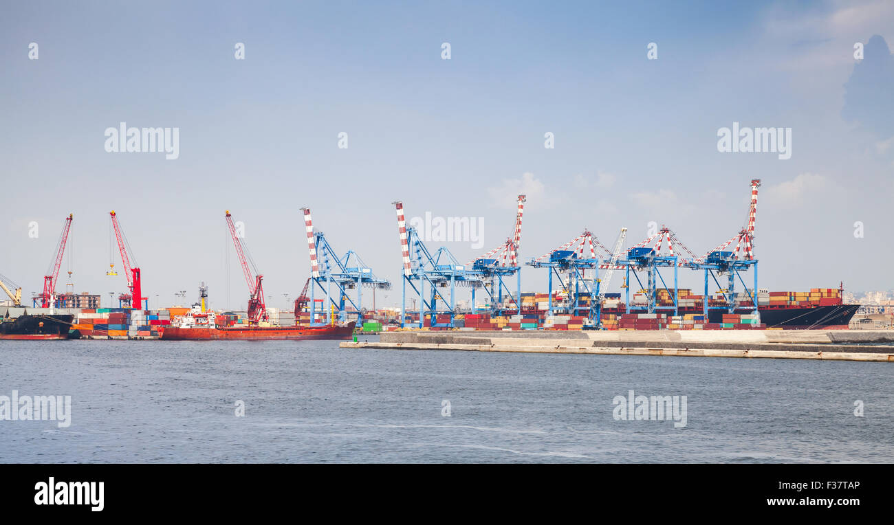 Port of Naples, coastal cityscape with container cranes working in the ...