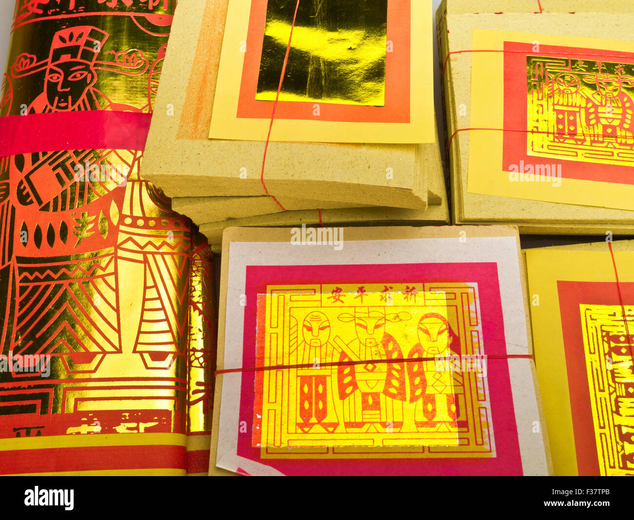 Ghost Money - paper made to resemble money and burned as an offering to ...