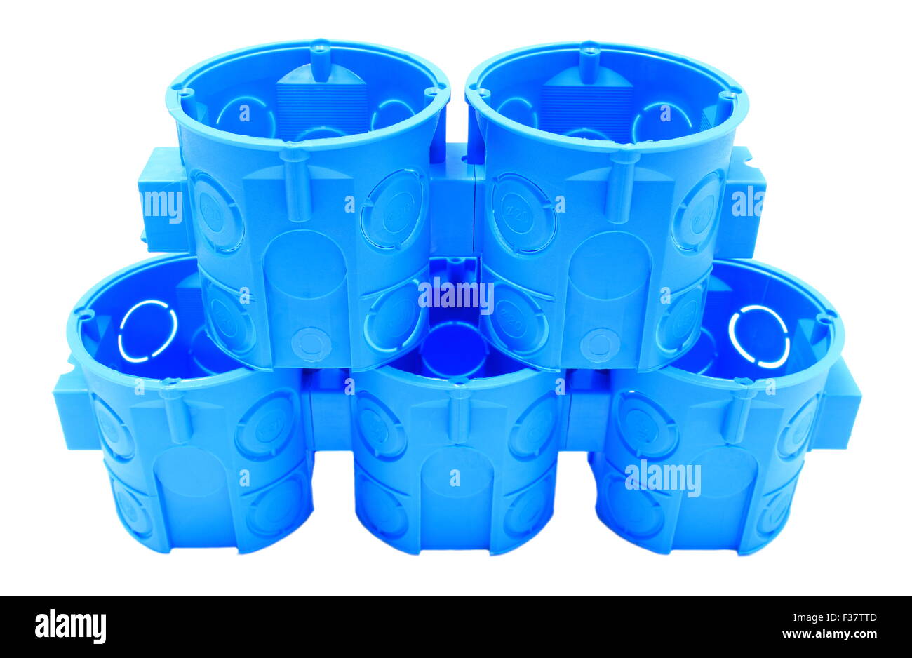 Stack of blue plastic electrical boxes on white background, junction ...