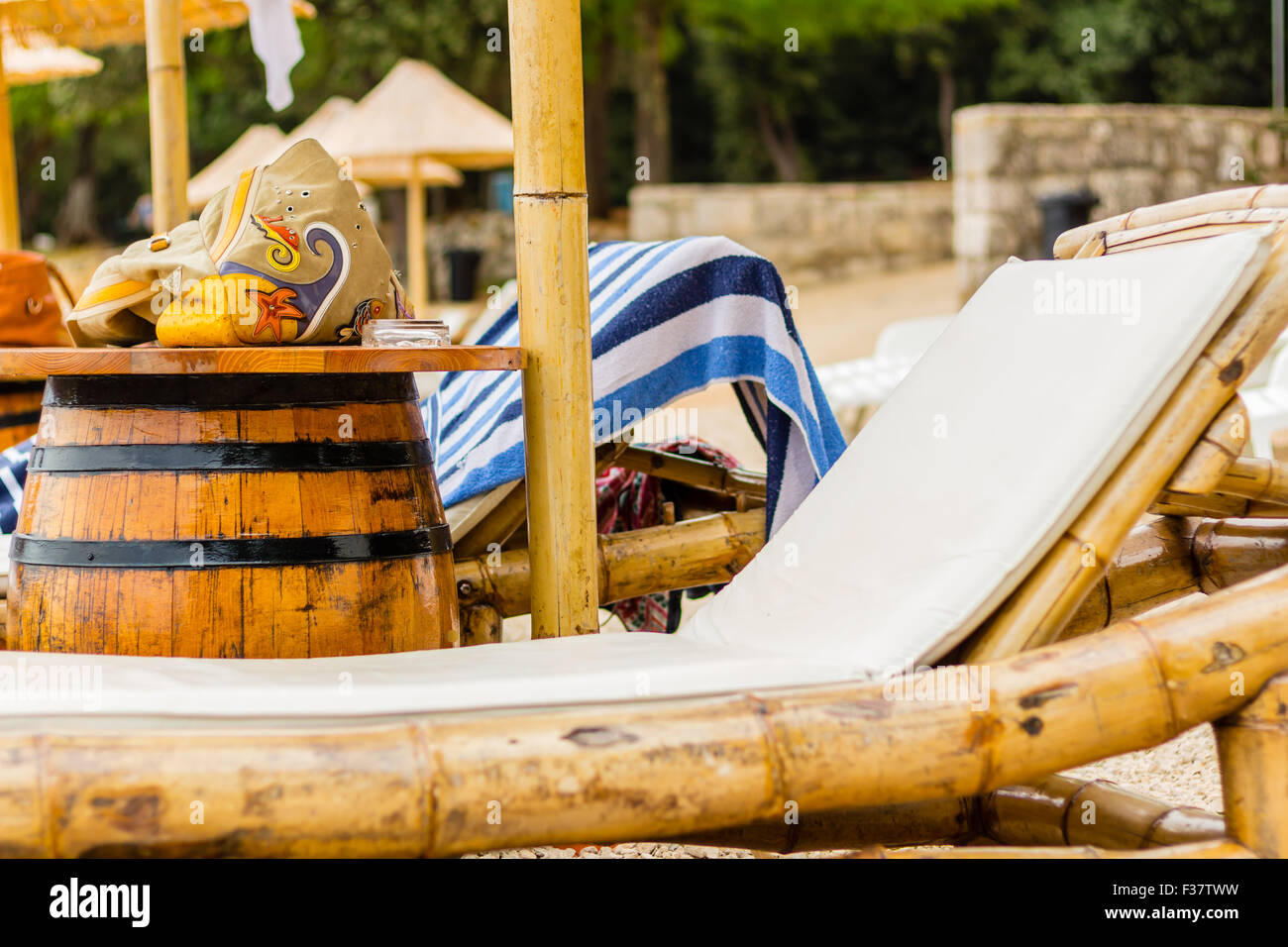 Beach chair and umbrella on sand beach. Concept for rest, relaxation ...