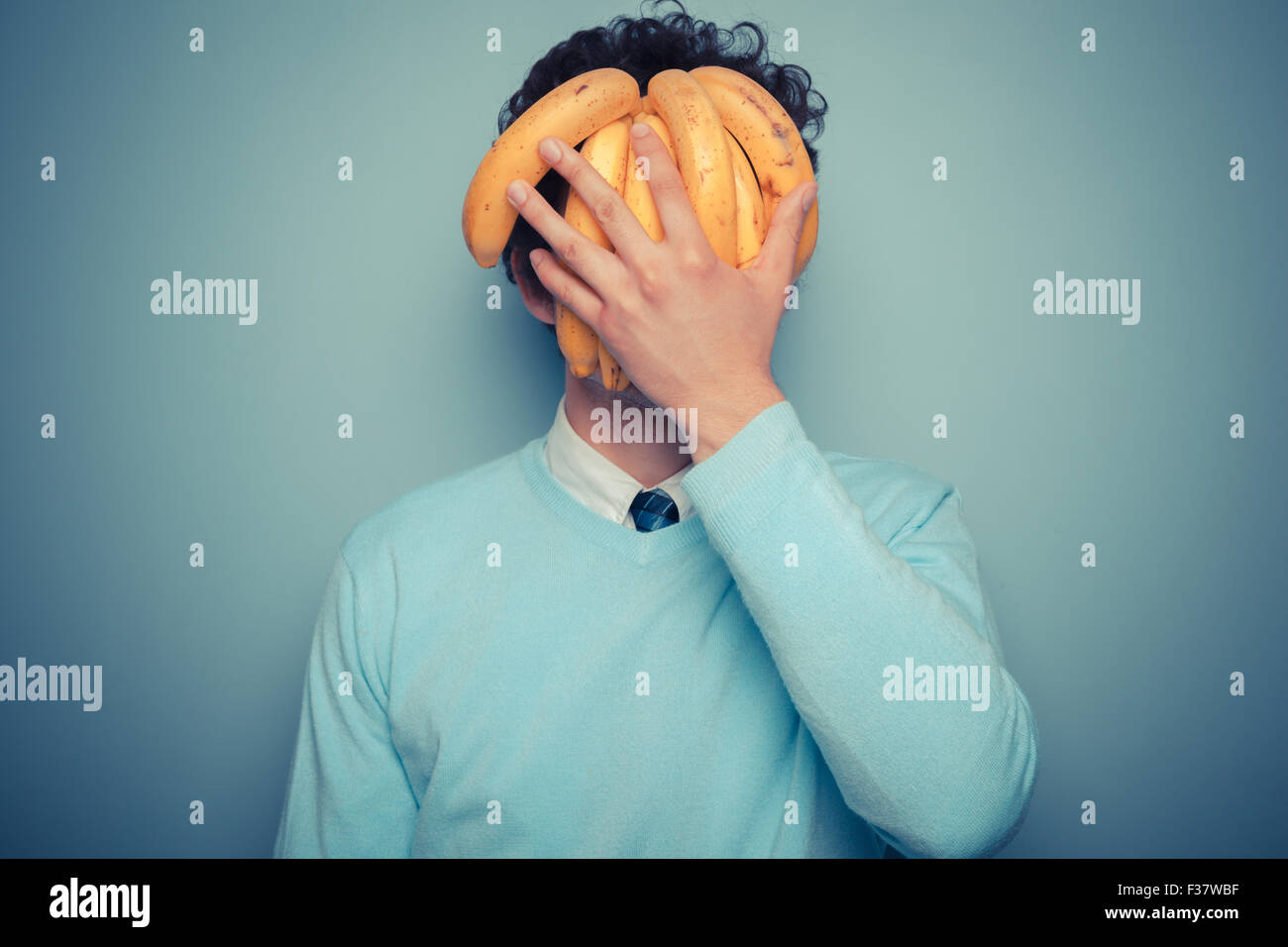 Strange young person hiding hi-res stock photography and images - Alamy