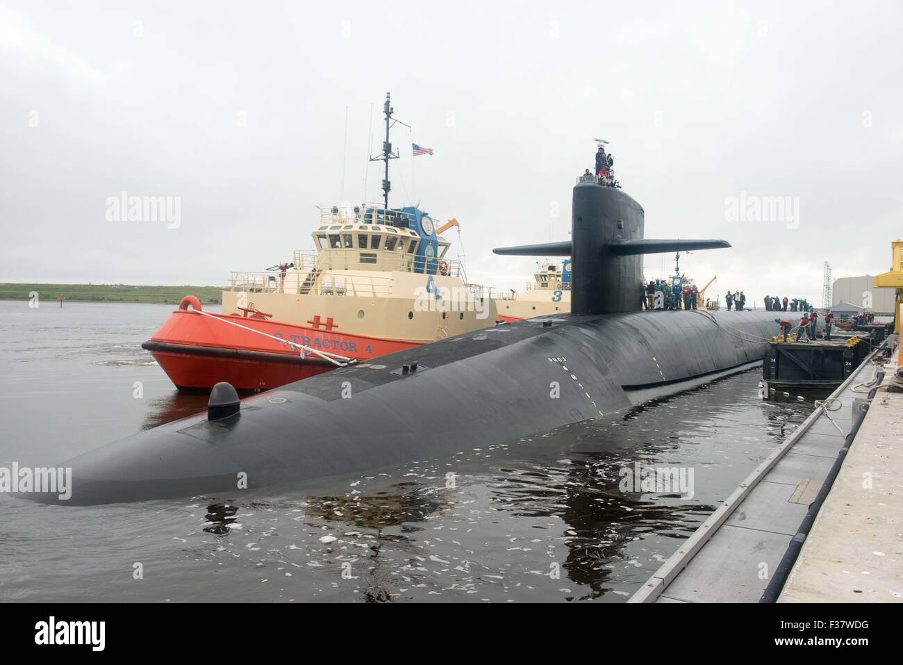 US Navy Ohio-class ballistic missile submarine USS Rhode Island docks ...