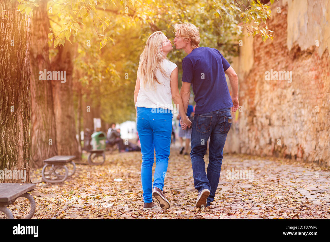 Young couple taking a walk Stock Photo - Alamy