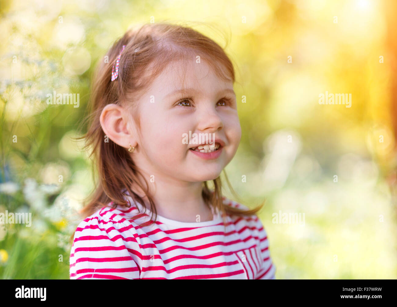 Little girl in nature Stock Photo - Alamy