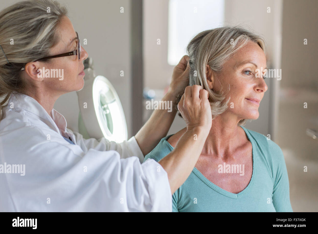 General medical examination woman hi-res stock photography and images ...