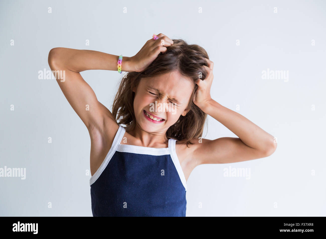 Girl scratching her head hi-res stock photography and images - Alamy