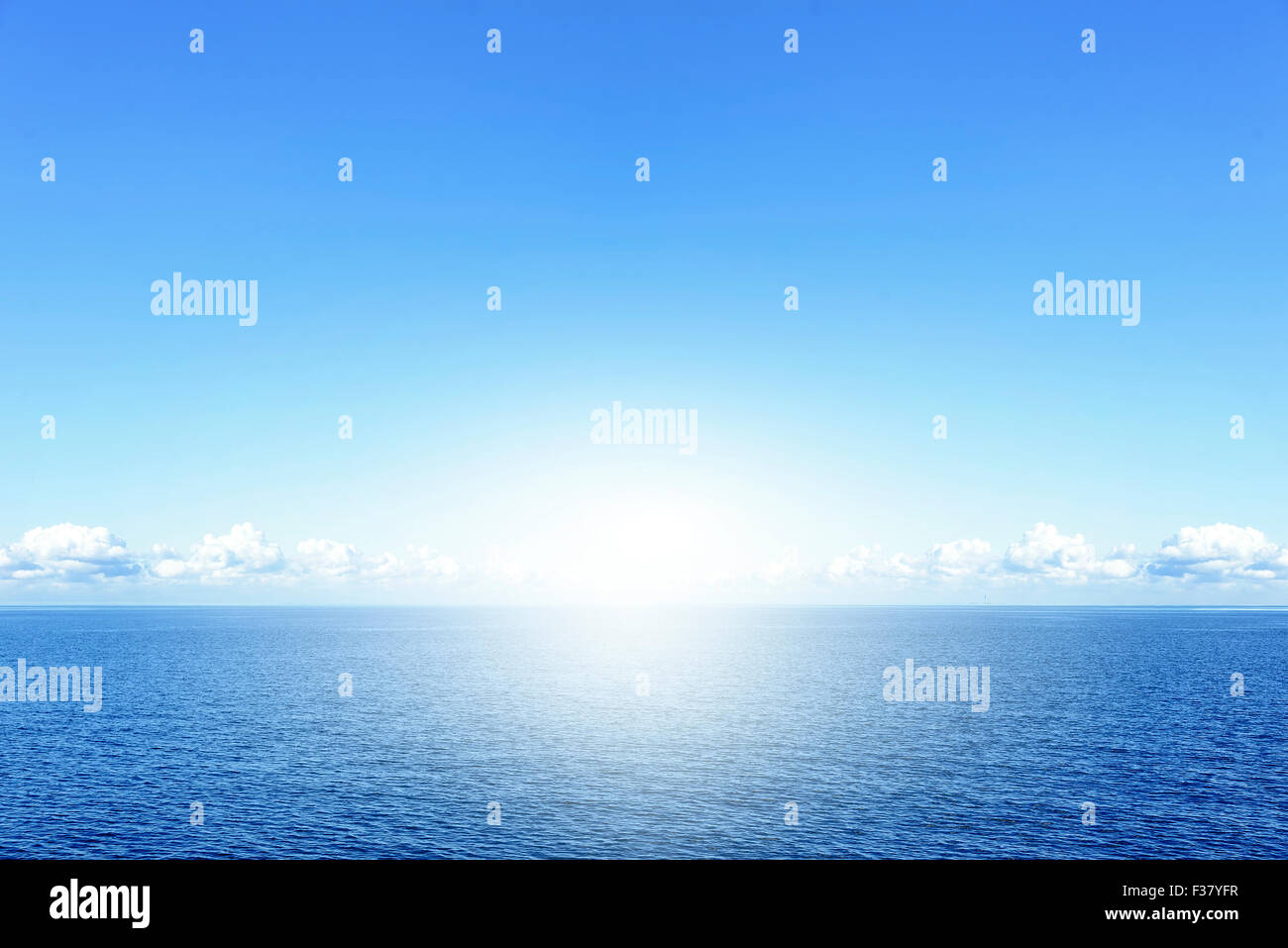 Blue sea and clouds Stock Photo - Alamy
