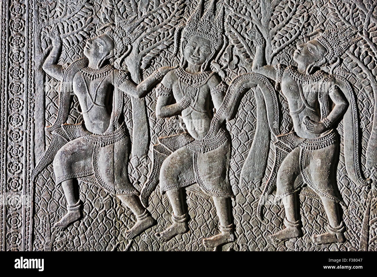 Bas-relief of three Apsaras (celestial dancers) in Angkor Wat temple ...