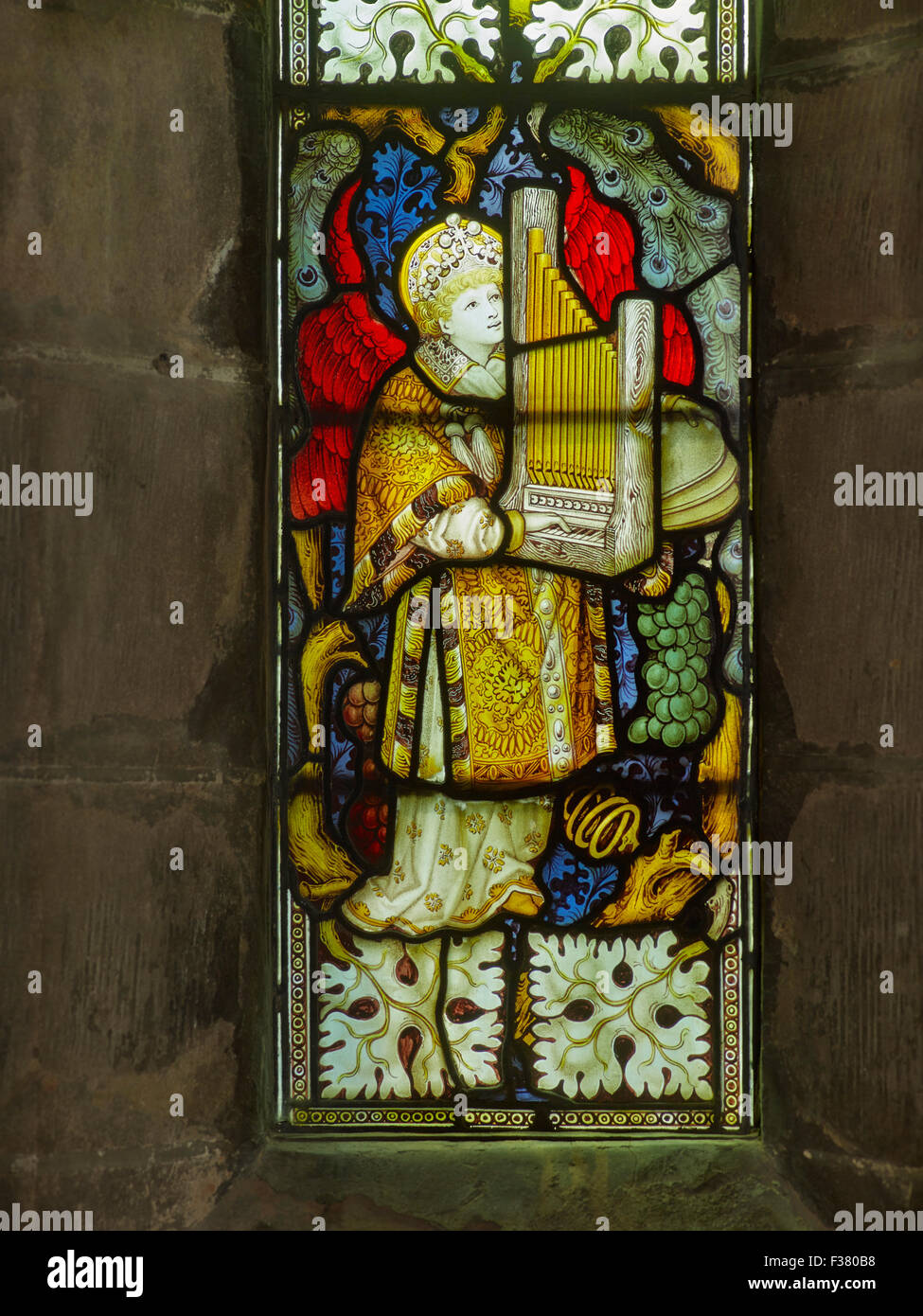 Lichfield Cathedral angel playing organ window Stock Photo - Alamy