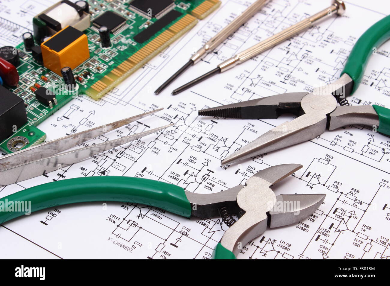 Printed circuit board with electrical components and precision tools ...