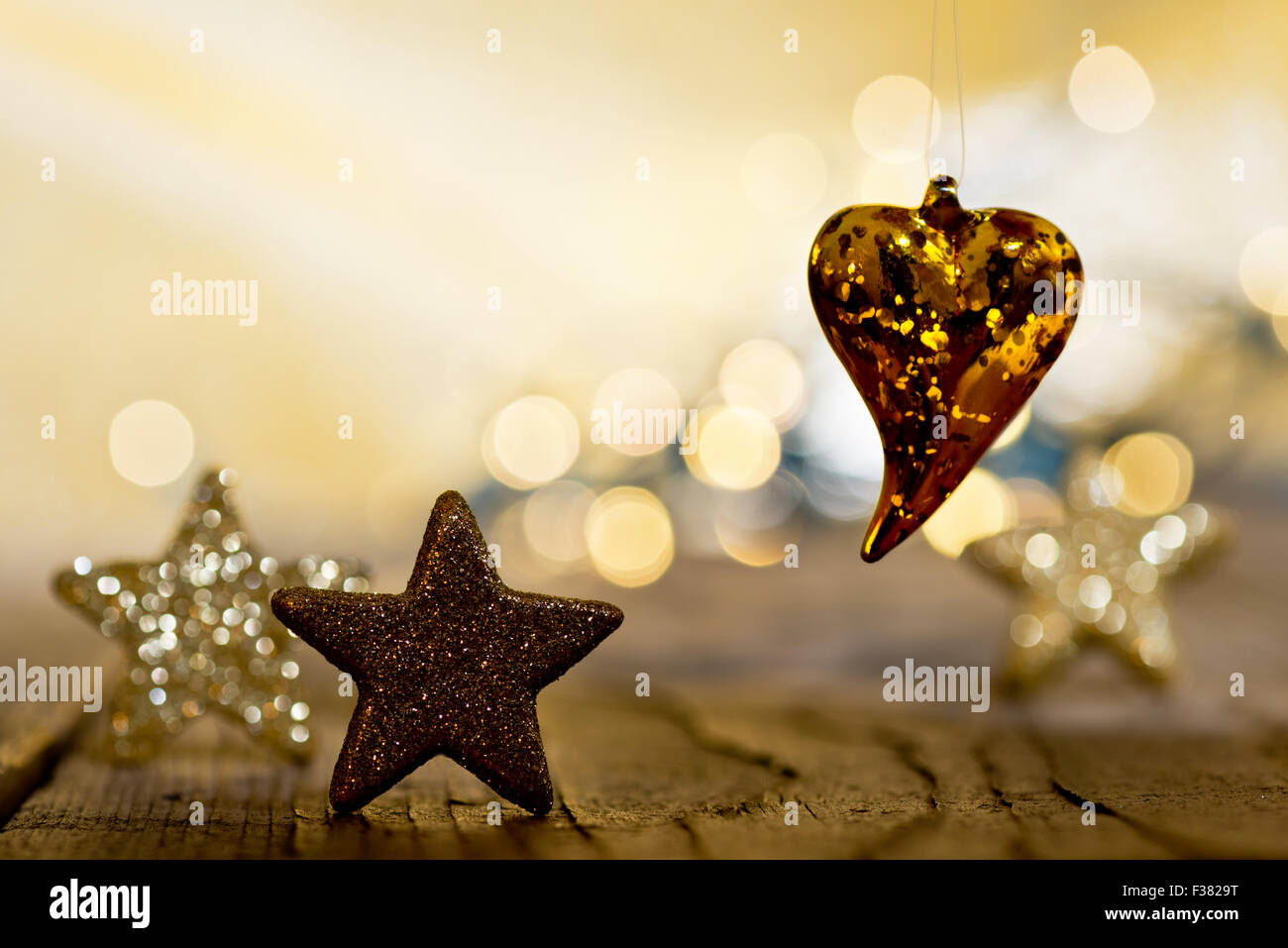 Christmas background with three stars and heart Stock Photo - Alamy