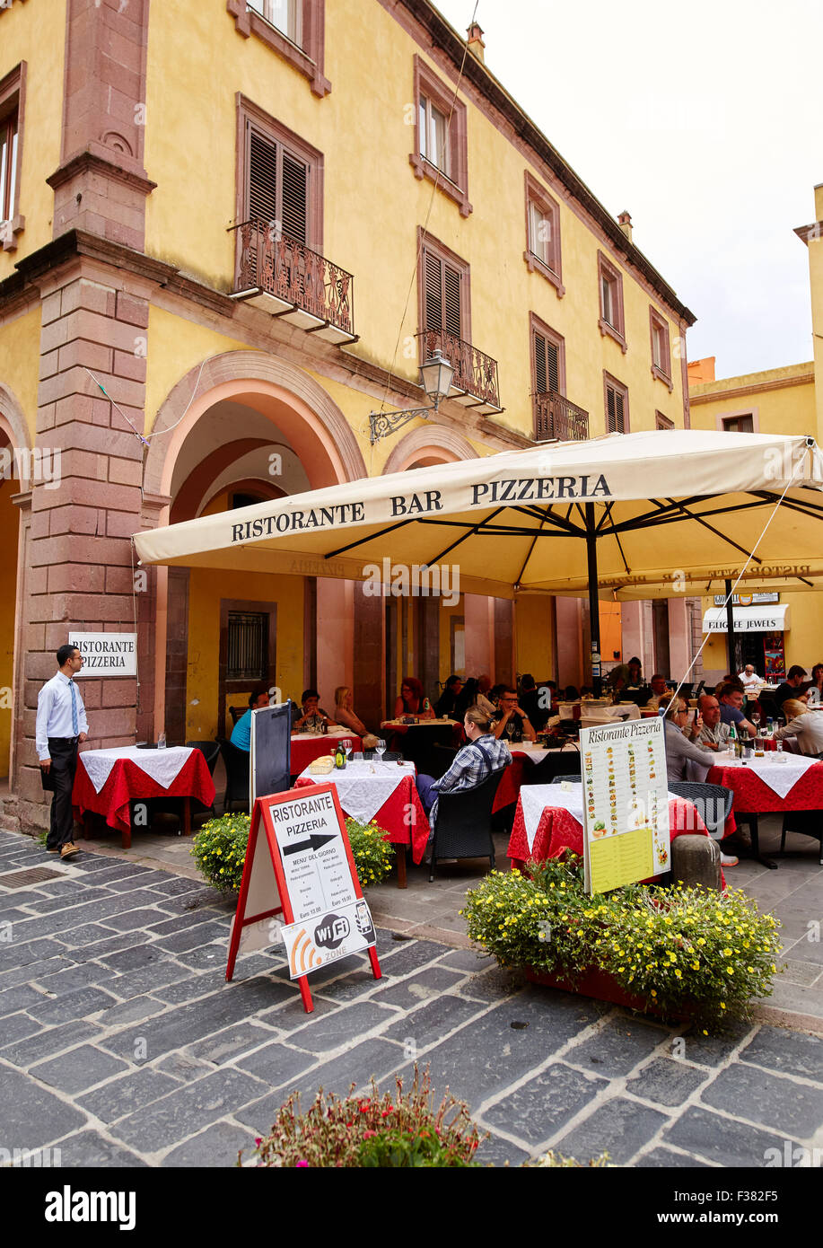 Cafe scenes, Bosa, Sardinia Stock Photo - Alamy
