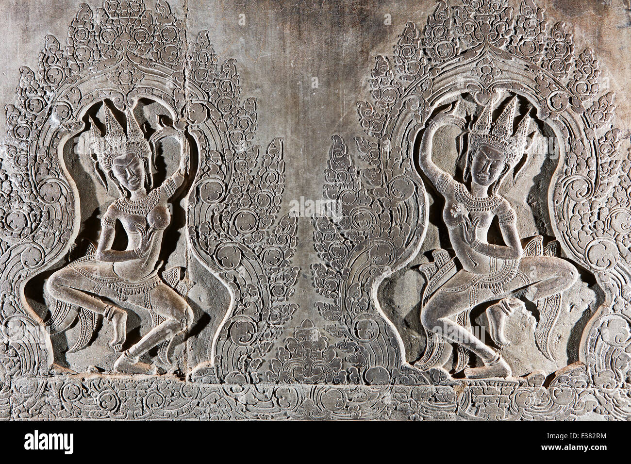 Bas-relief of apsaras (celestial dancers) in Angkor Wat temple. Angkor ...