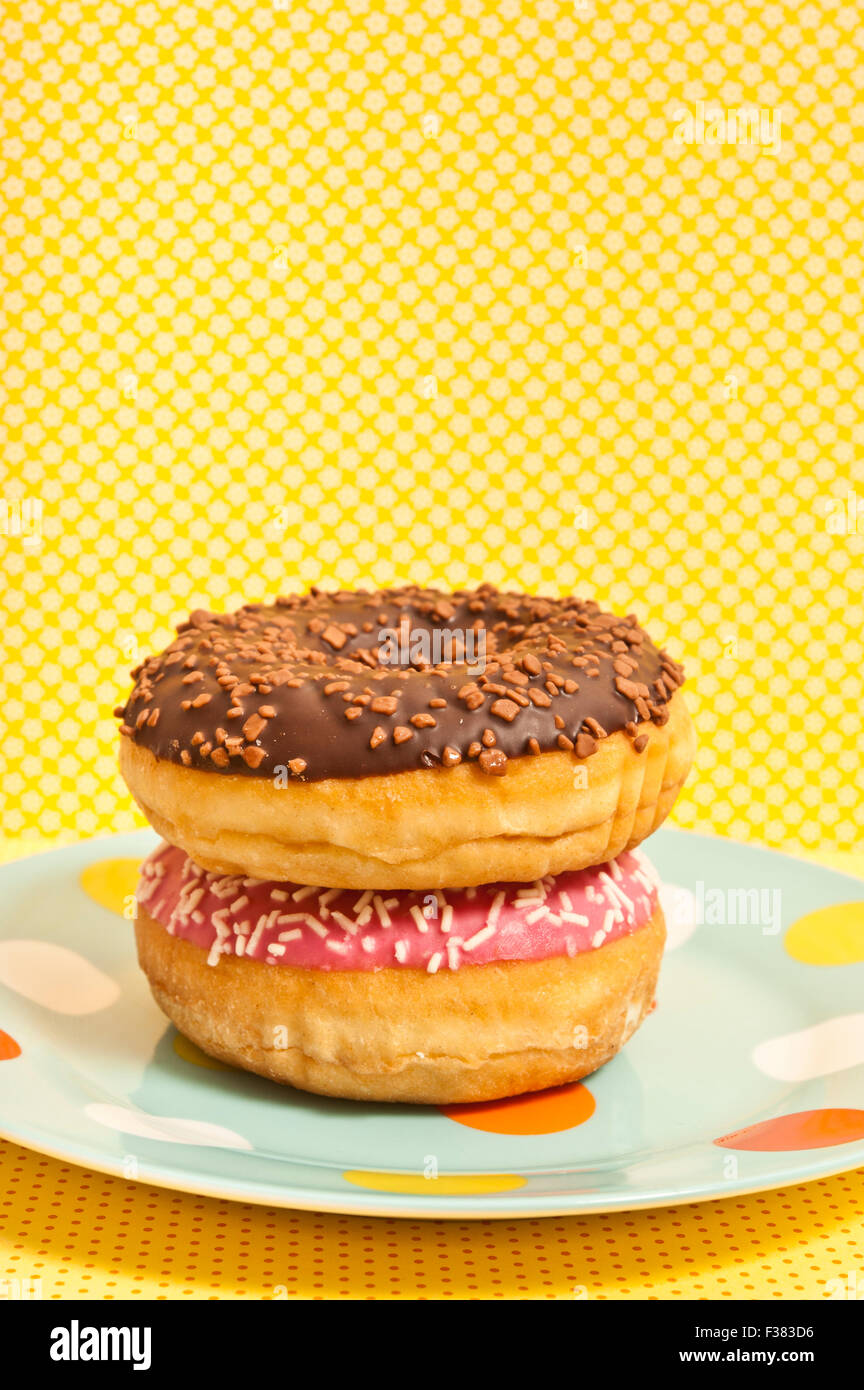 glazed doughnuts on a plate Stock Photo - Alamy