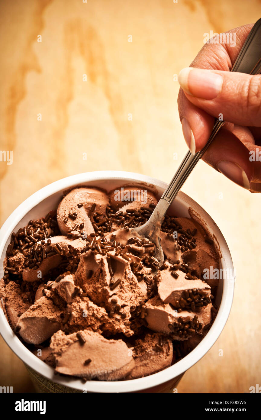 Hand scooping ice cream hi-res stock photography and images - Alamy