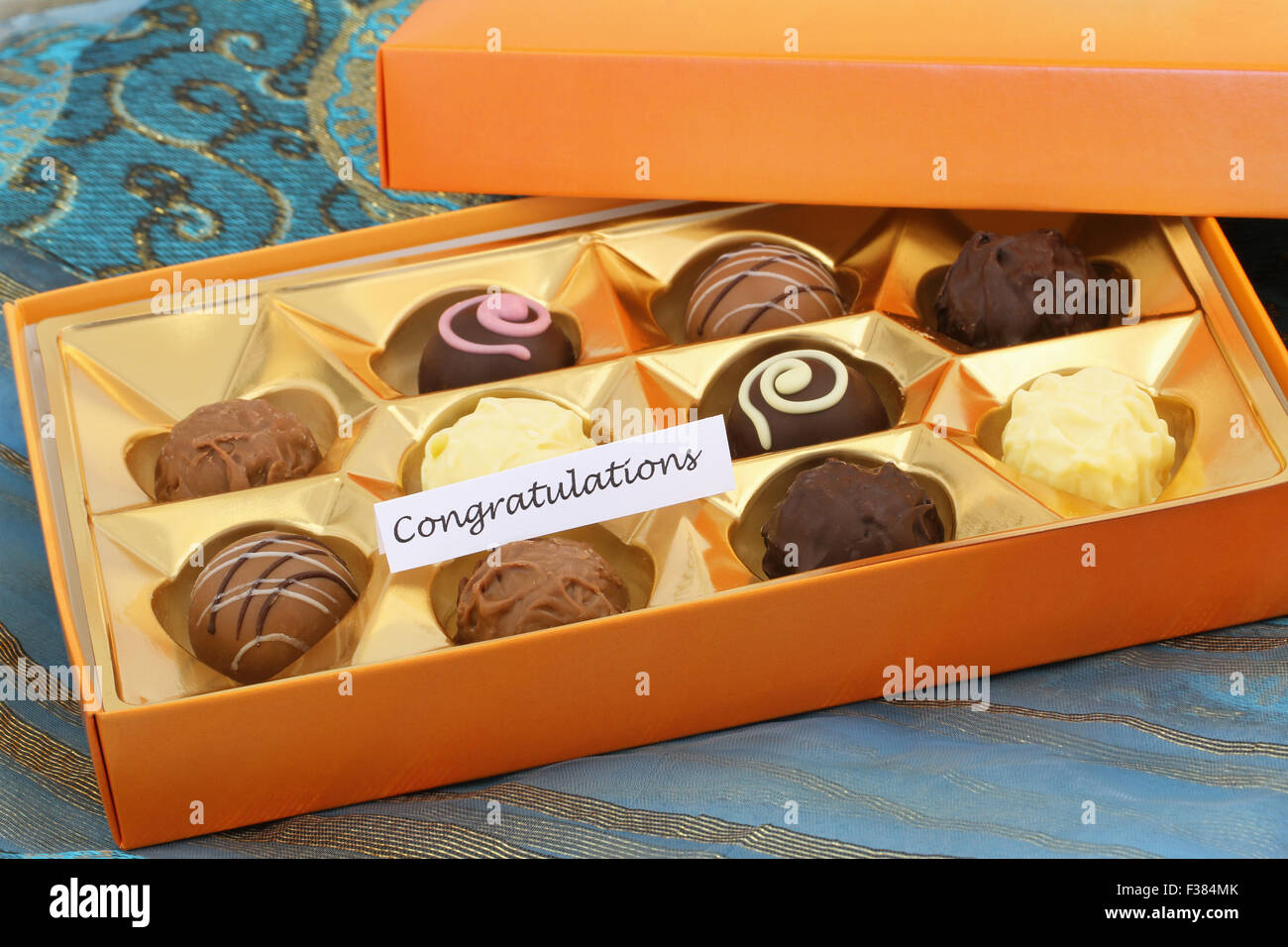 Congratulations card with box of assorted milky, white and pure ...
