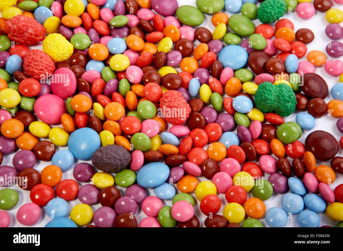 Sweets mixed selection multi colored background sweet food Stock Photo ...