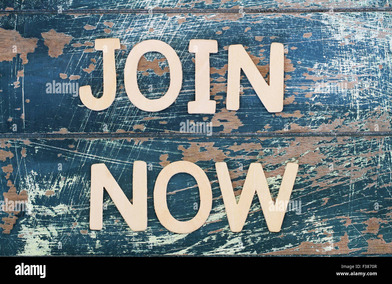 Join now written with wooden letters on rustic surface Stock Photo - Alamy