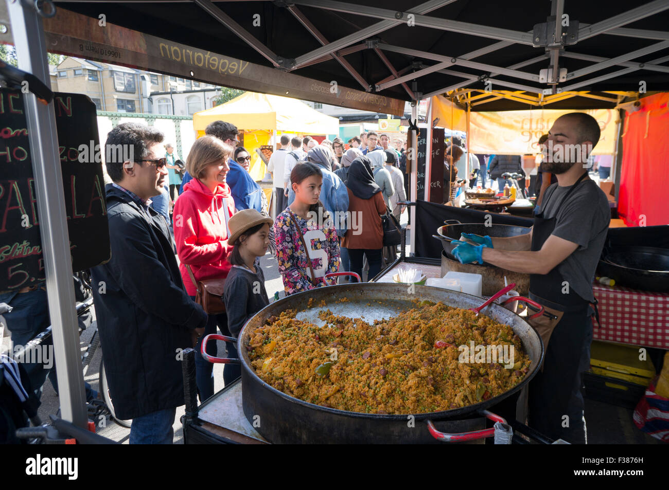 People eating in brick lane hi-res stock photography and images - Alamy